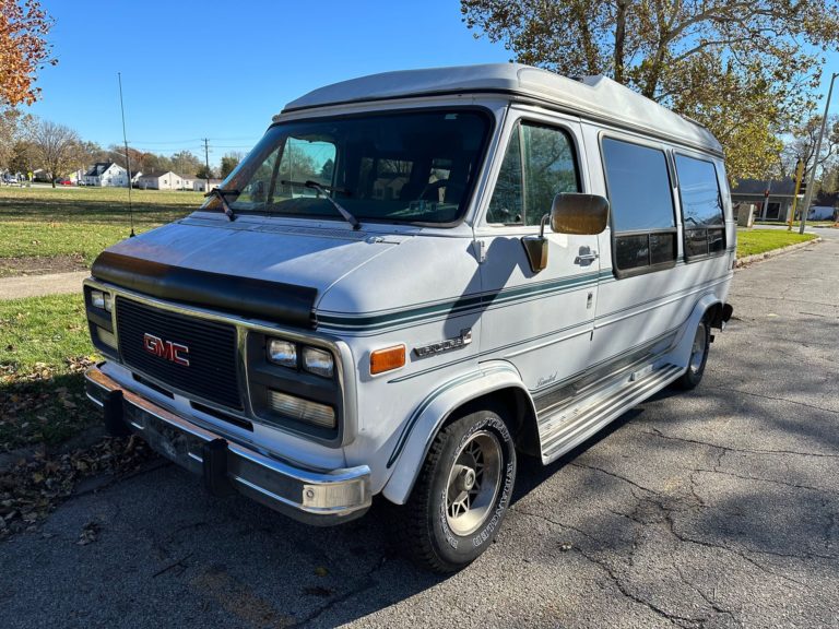 GMC Vandura Explorer 1993 interieur cuir | Voitures 2 Collection